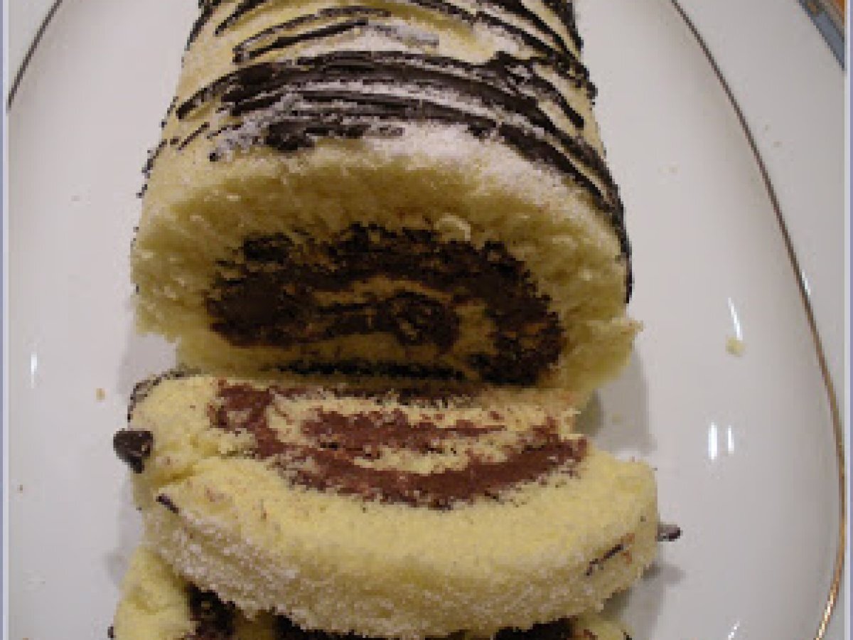 Ricetta rotolo dolce farcito con crema al cioccolato